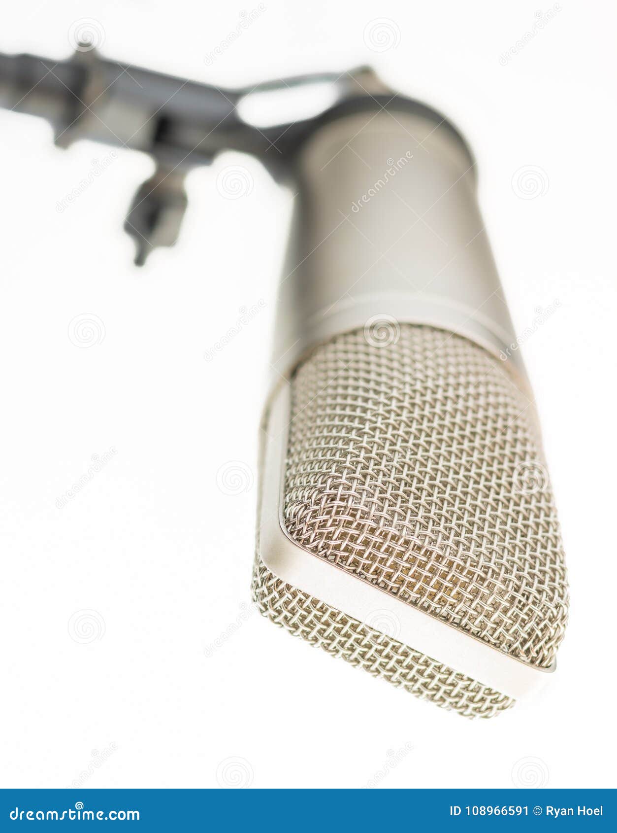 An Old Fashioned Microphone in Front of a White Background Stock Image ...