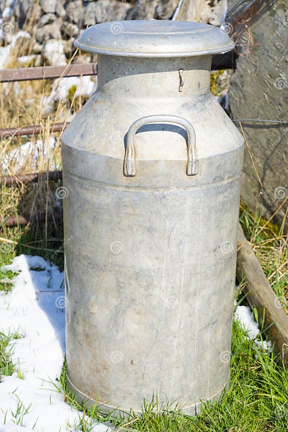 Old fashioned Milk Churn stock photo. Image of background - 249389866