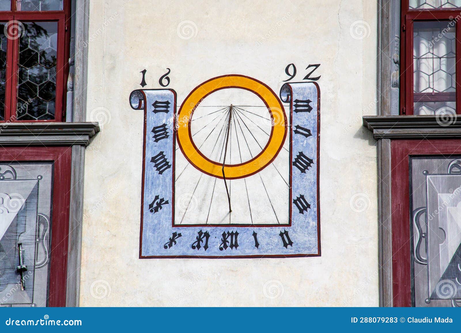 Old Fashioned Solar Clock on a Building in Swiss Stock Image - Image of ...