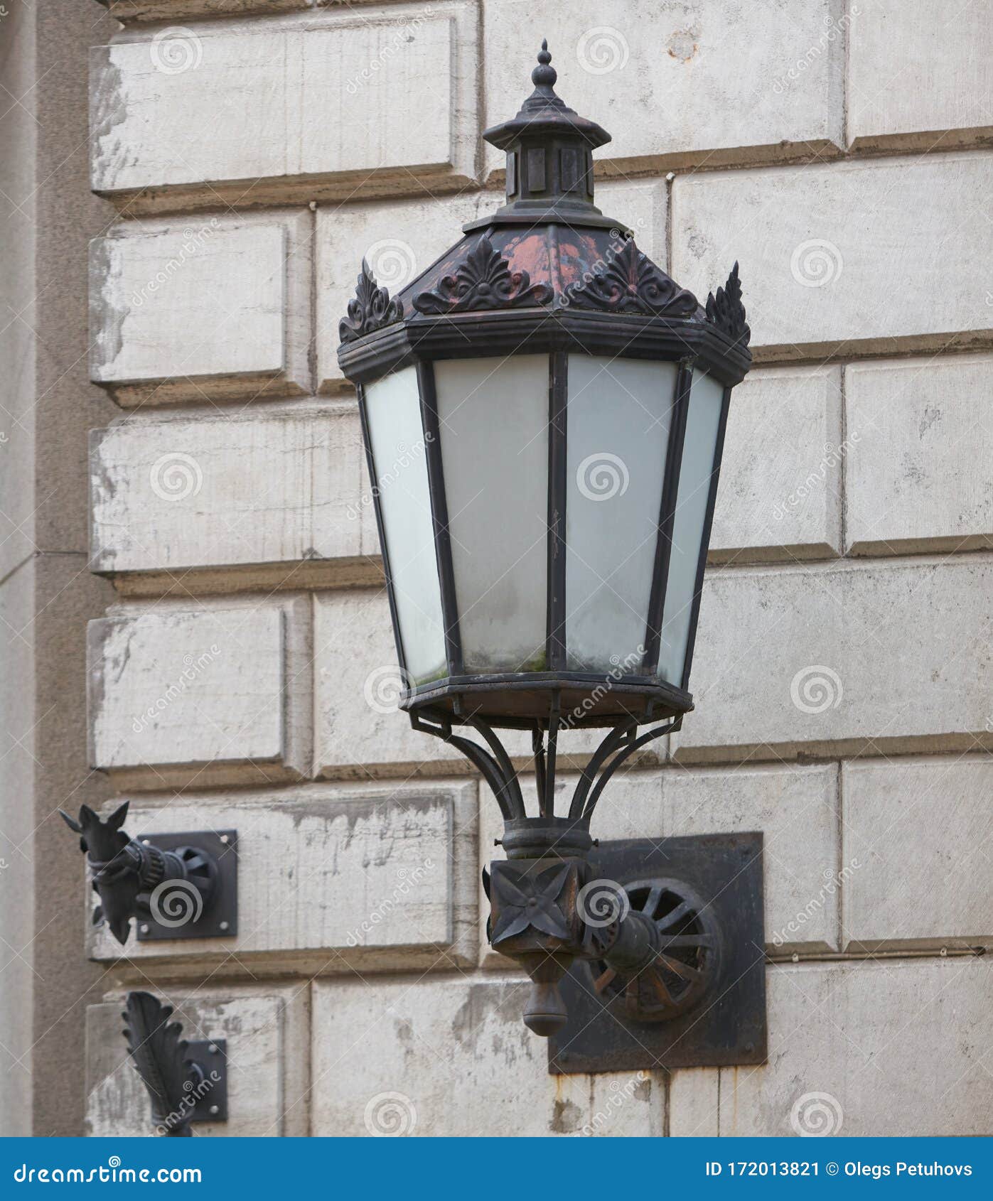 Old Fashioned Street Light at Wall Stock Image - Image of wrought ...