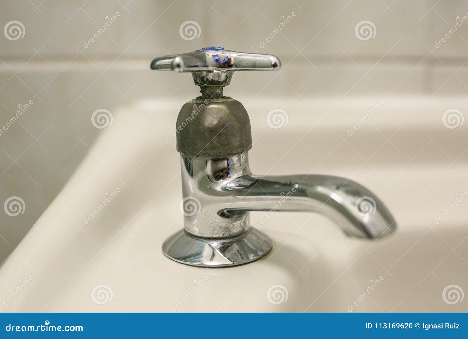 Old faucet in a wash stock photo. Image of backlight - 113169620