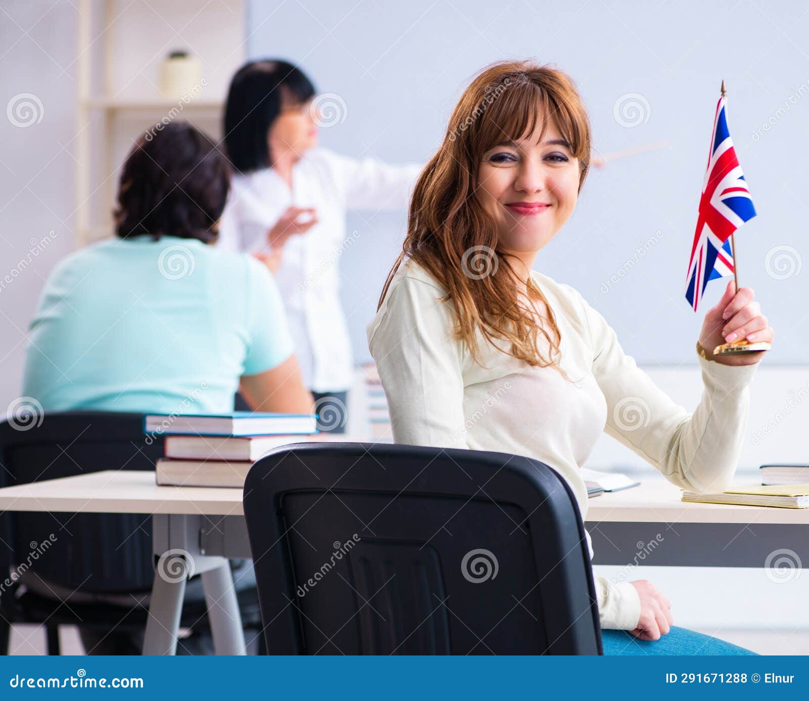 Old Female English Teacher and Students in the Classroom Stock Photo ...