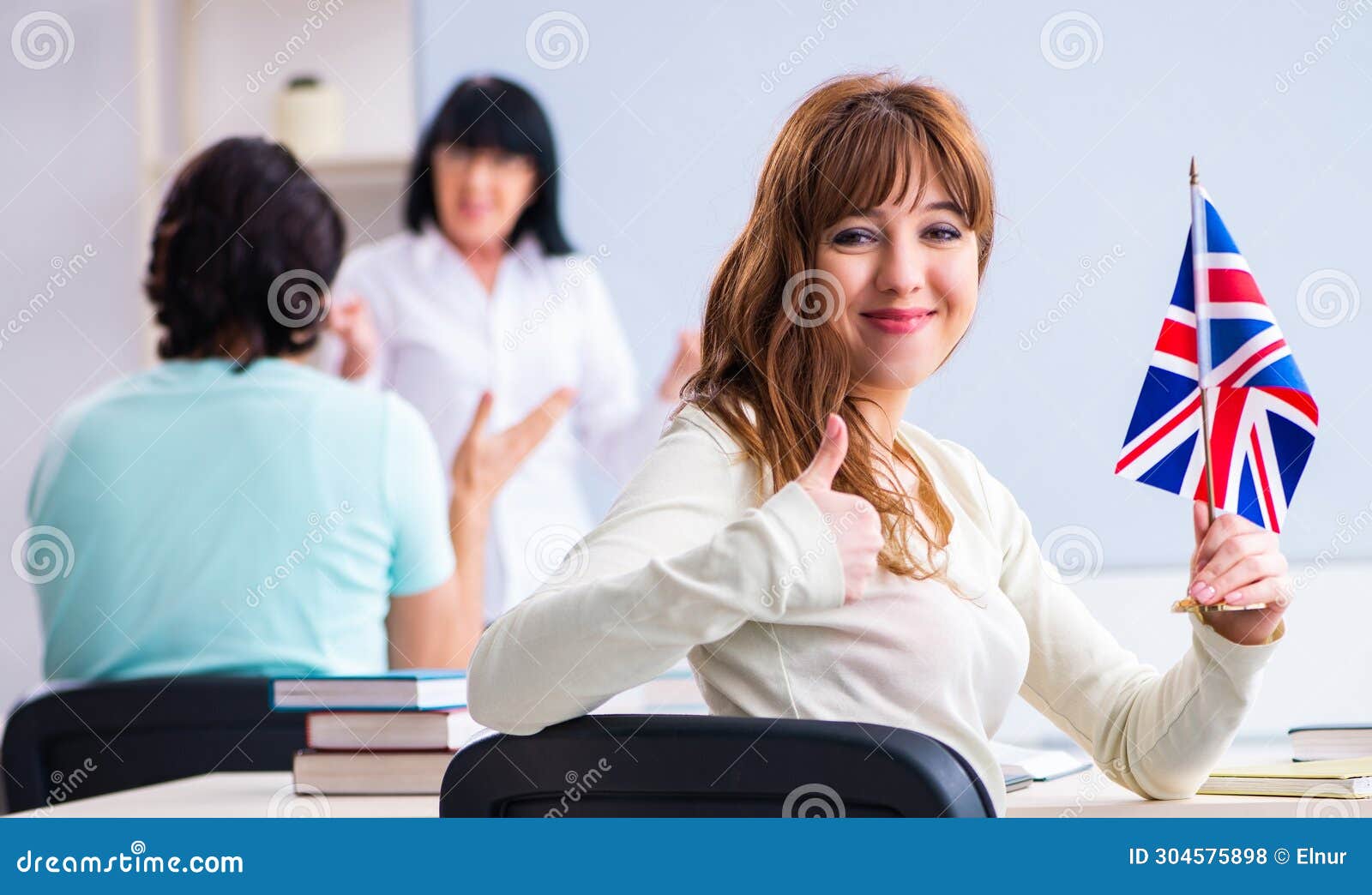 Old Female English Teacher and Students in the Classroom Stock Photo ...