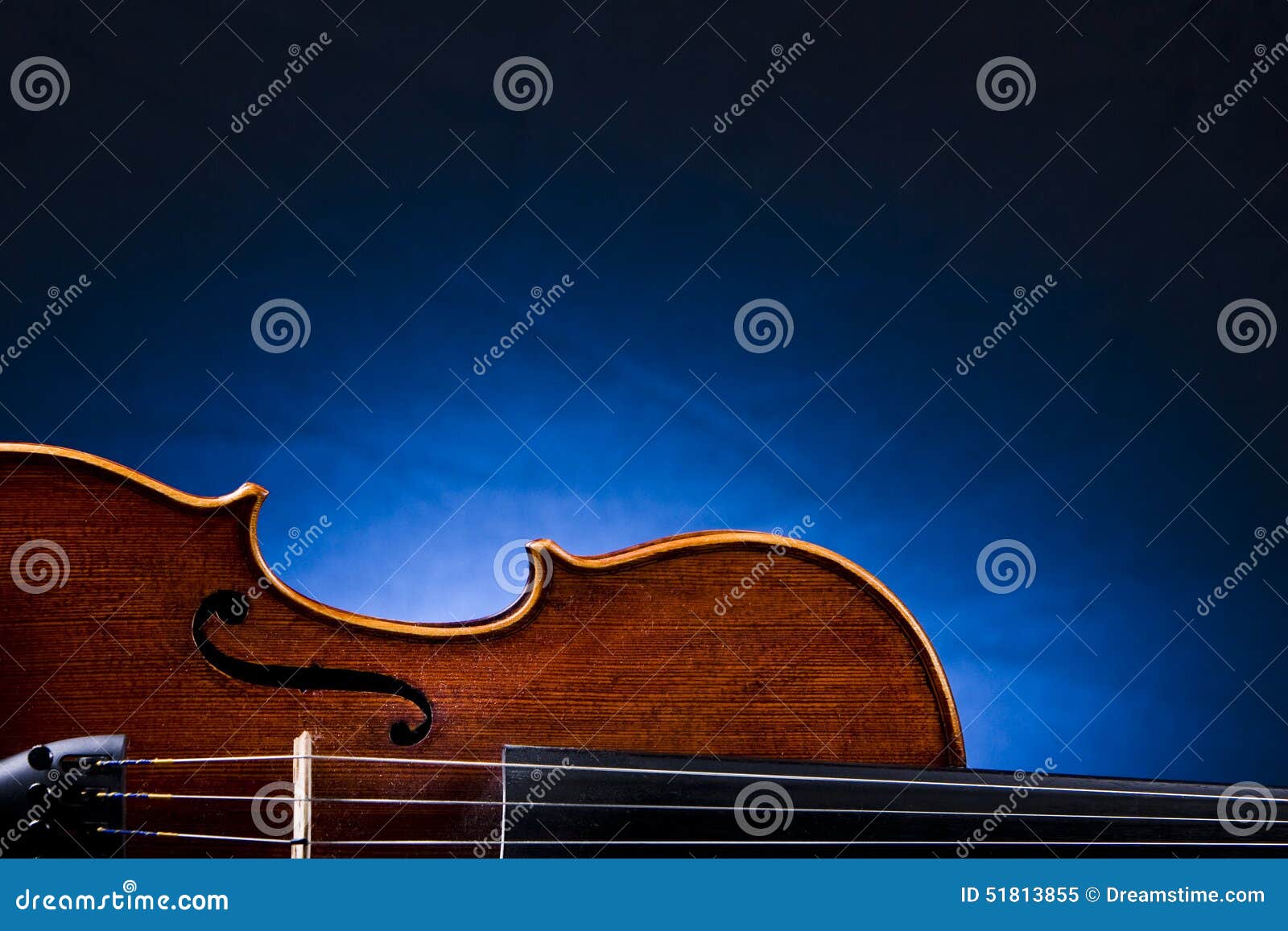 Old Fiddle Against a Blue Background Stock Image - Image of orchestral ...