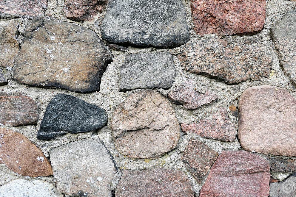 Old Fieldstone Wall of Field Rocks. Full Frame Background Stock Photo ...