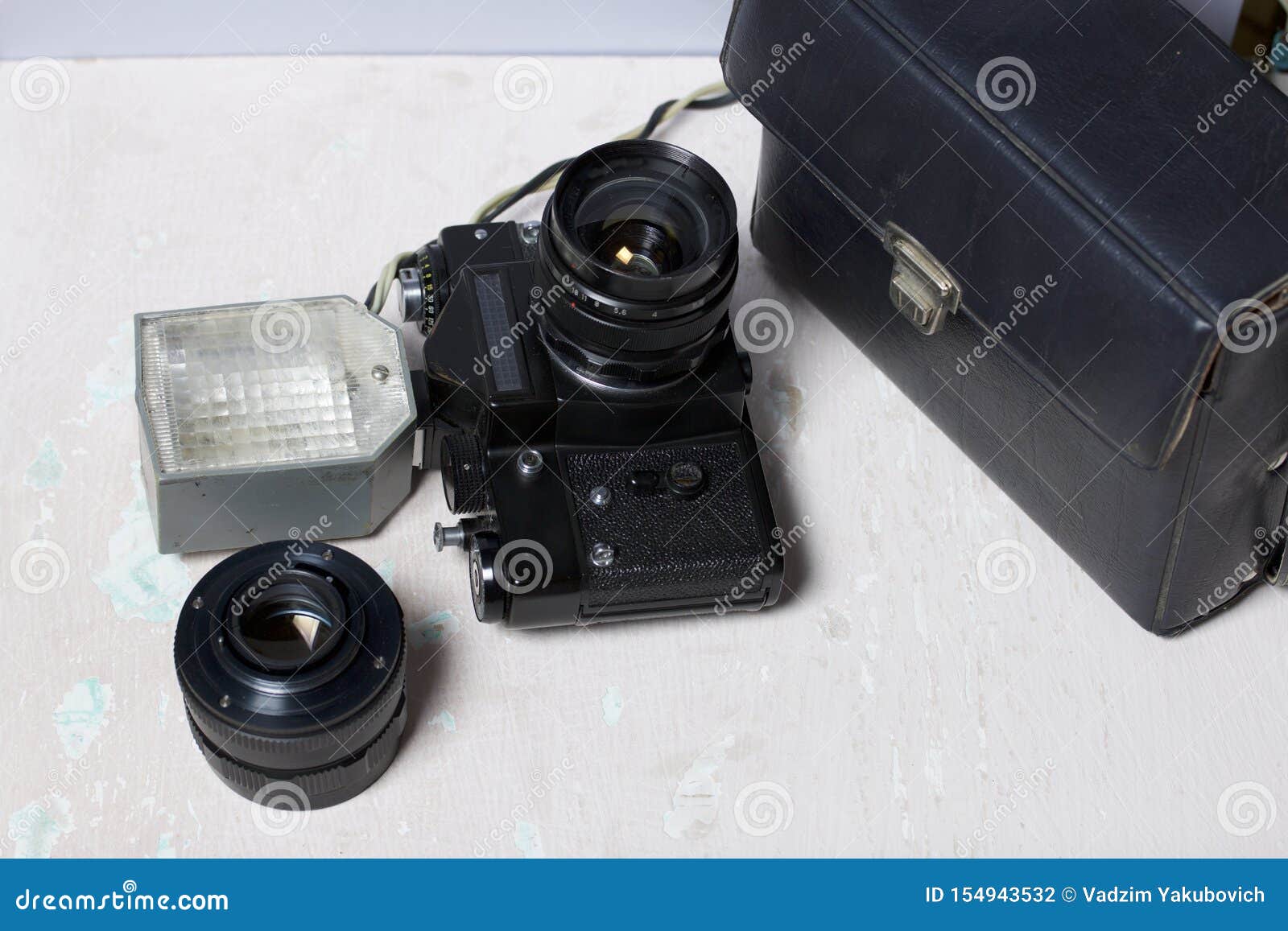 Old Film Camera, Removable Lens and Wired Flash. they Lie on the ...