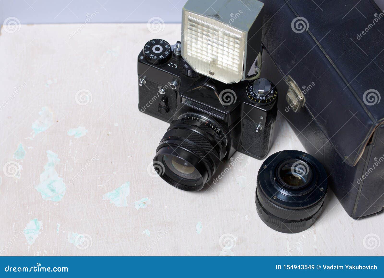 Old Film Camera, Removable Lens and Wired Flash. they Lie on the ...
