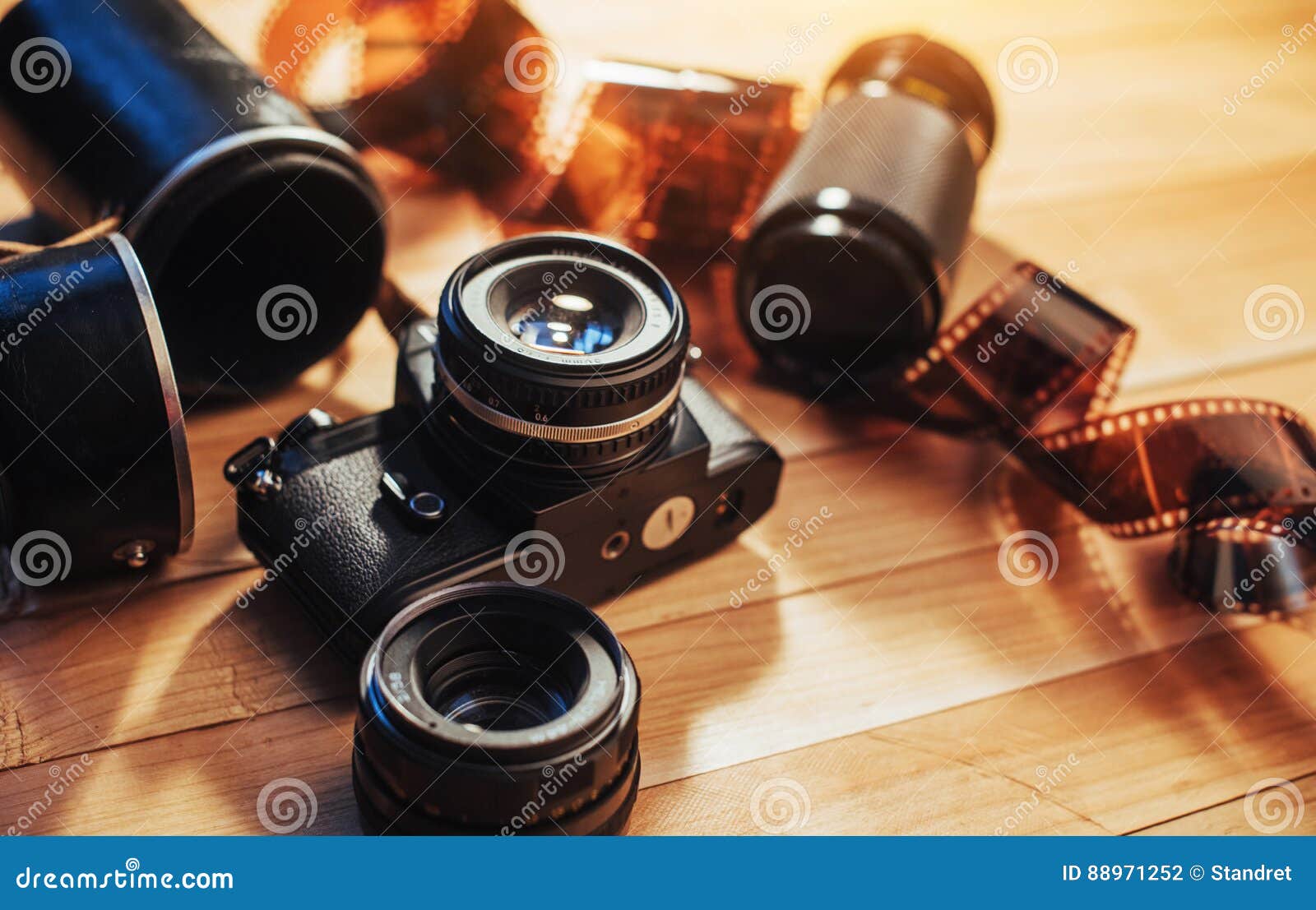 Old Film Camera and a Roll of on Wood Stock Photo - Image of ...