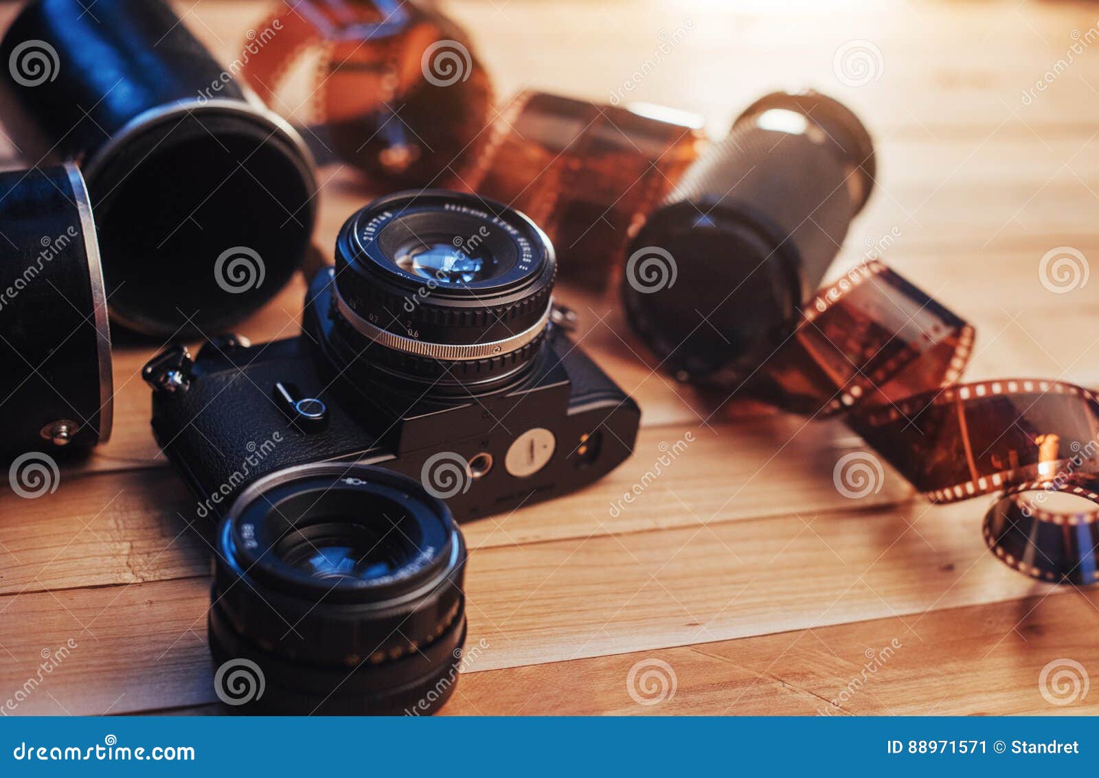 Old Film Camera and a Roll of on Wood Stock Image - Image of classic ...