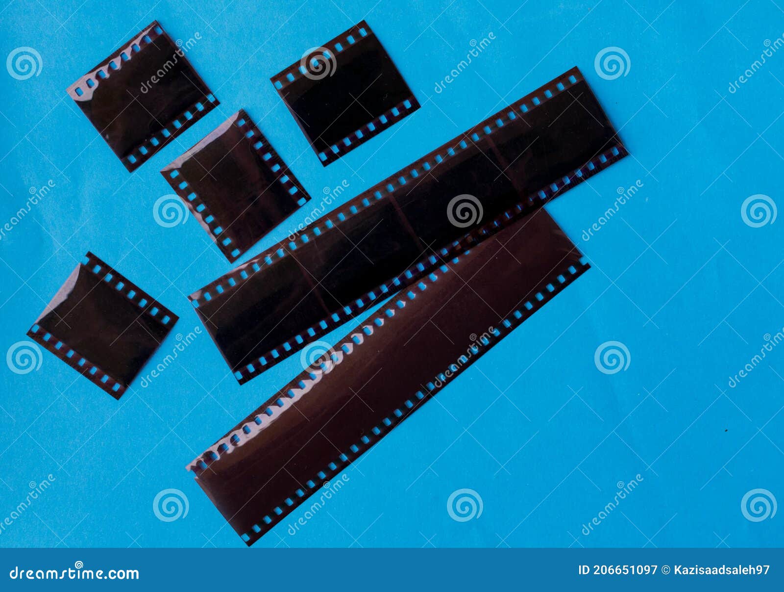 Old Film Negatives on a Plain Blue Colour Background Stock Image ...