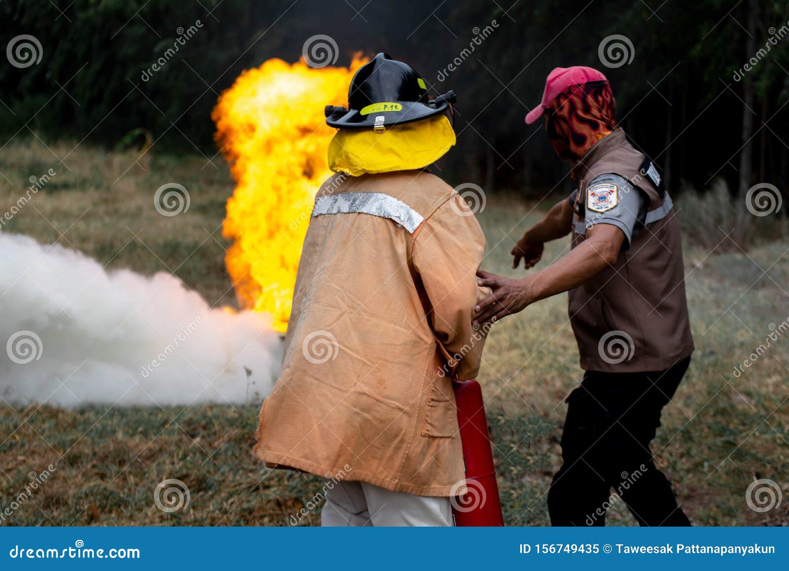 Old Fire Boots and Fireman with Fire Extinguisher. Editorial Image ...