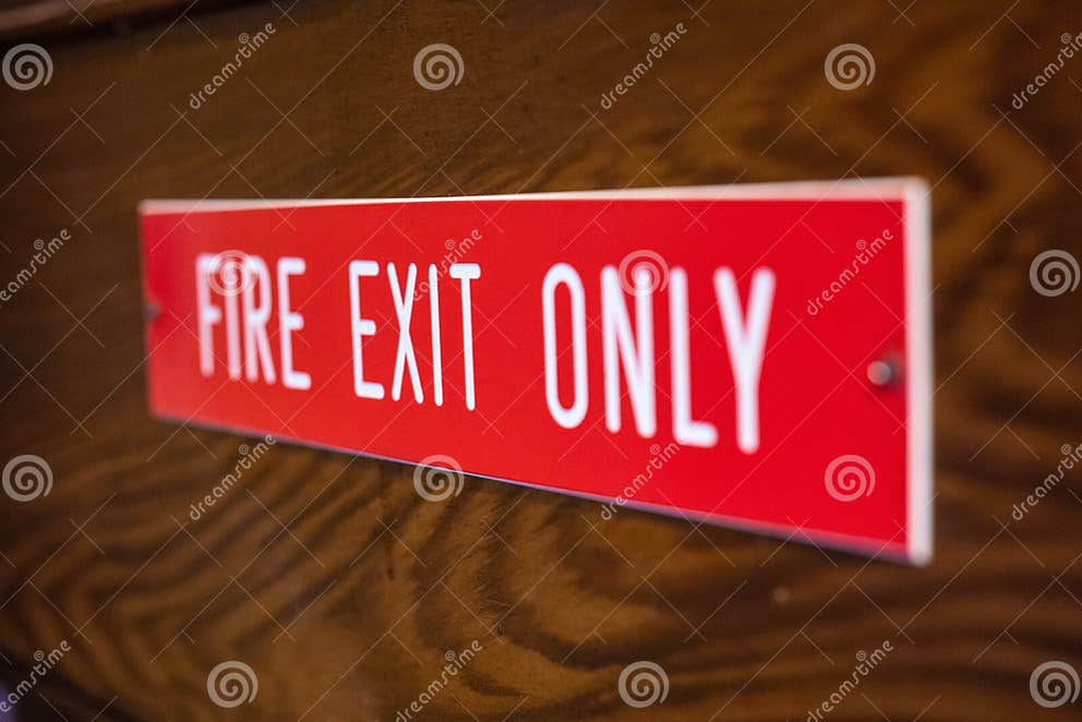 Old Fire exit only sign stock photo. Image of banner - 114021180