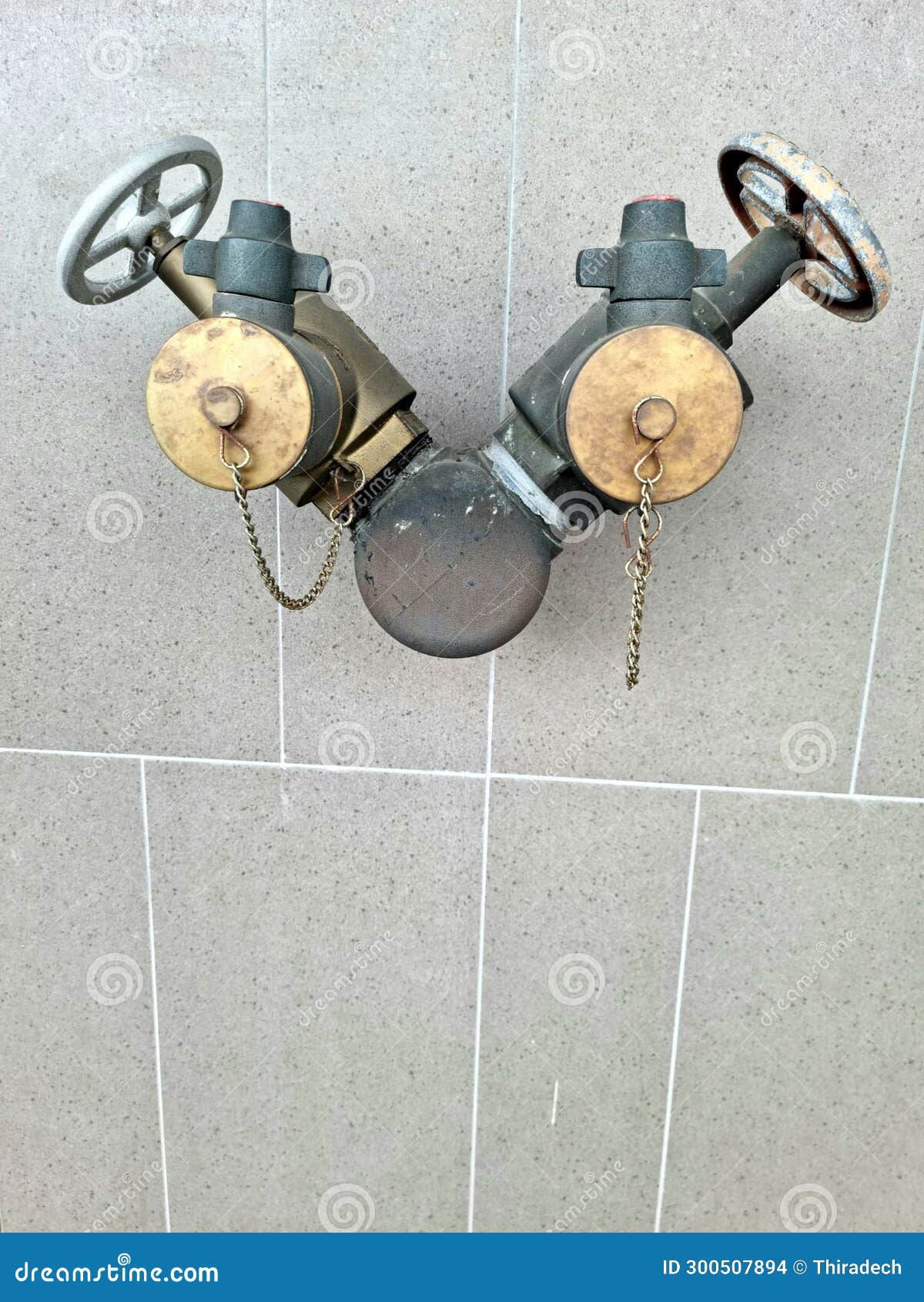 Old Fire Hydrant on the Wall of a Building Stock Photo - Image of ...