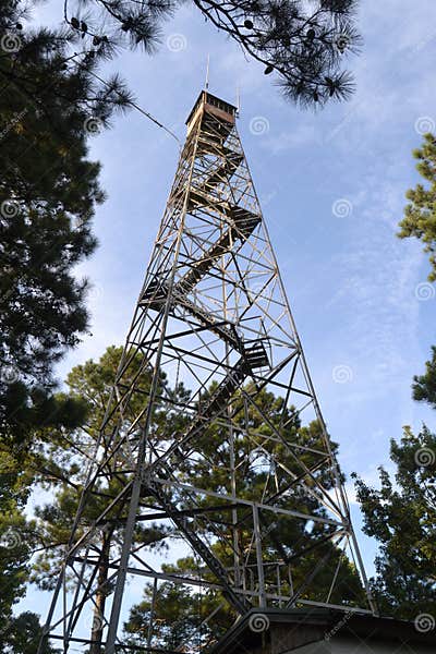Old fire tower in forest stock image. Image of building - 188089257