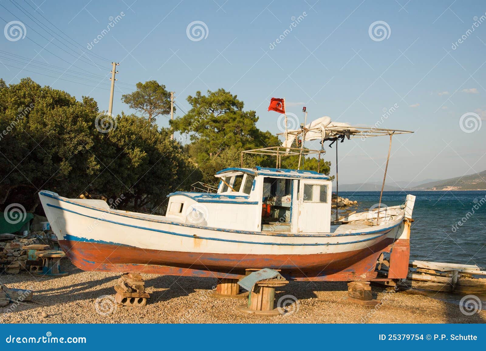 Old fishing boat stock photo. Image of coast, flag, mountains - 25379754