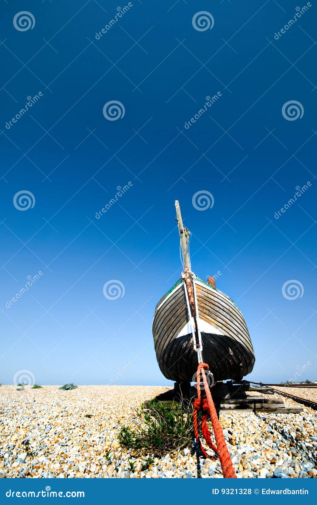 Old Fishing Boat on Pebble Beach Stock Photo - Image of summer, beach ...