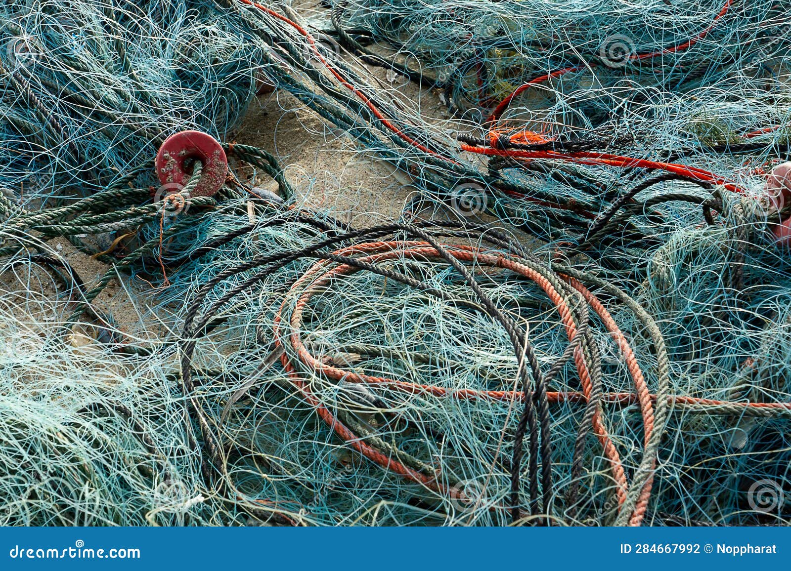 Old Fishing Net on the Beach Stock Photo - Image of equipment ...