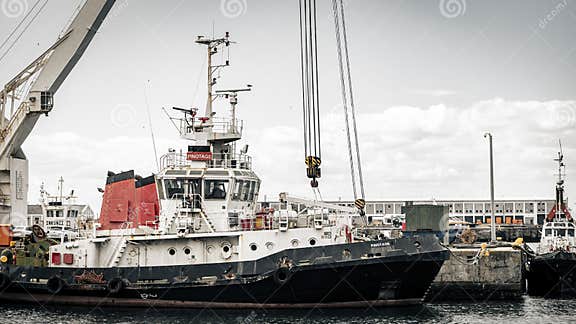 Old fishing ship on a deck editorial stock image. Image of cape - 268777379