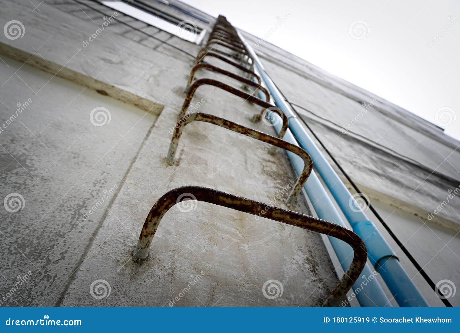 The Old Fixed Ladder with Old Building. Stock Image - Image of modern ...