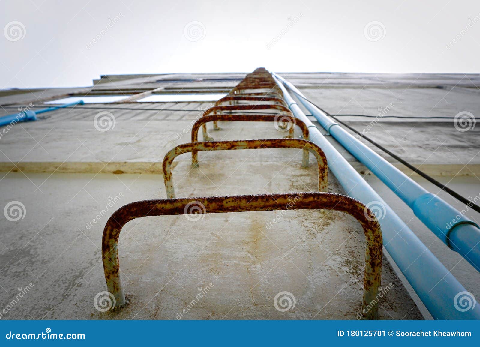 Fixed Ladder With Safety Cages Royalty-Free Stock Photo | CartoonDealer ...