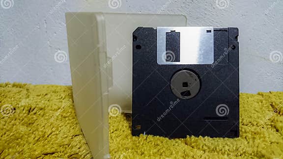 Floppy disk with a casing stock photo. Image of disk - 237035220