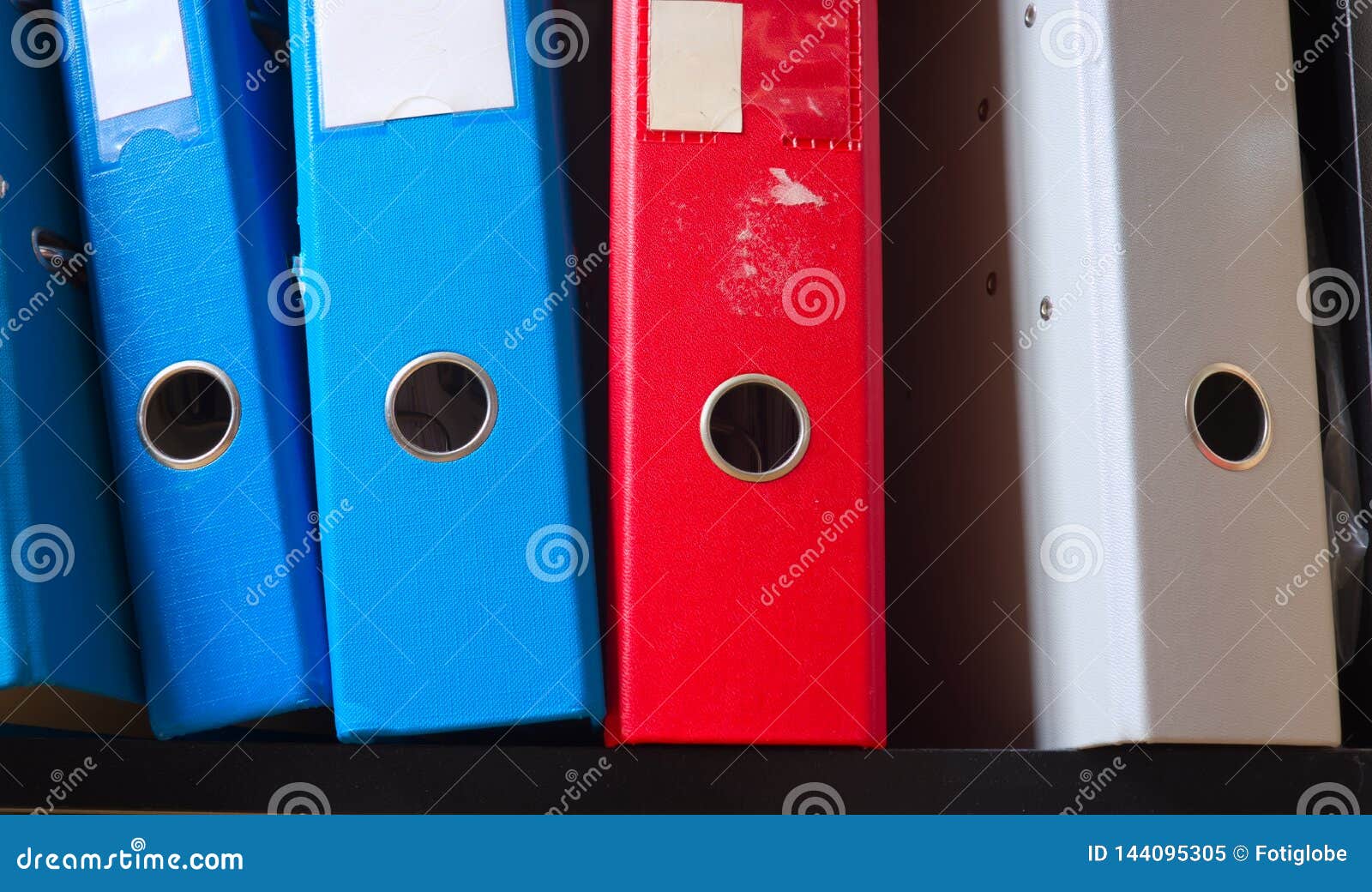 Old folders in bookshelf stock image. Image of office - 144095305
