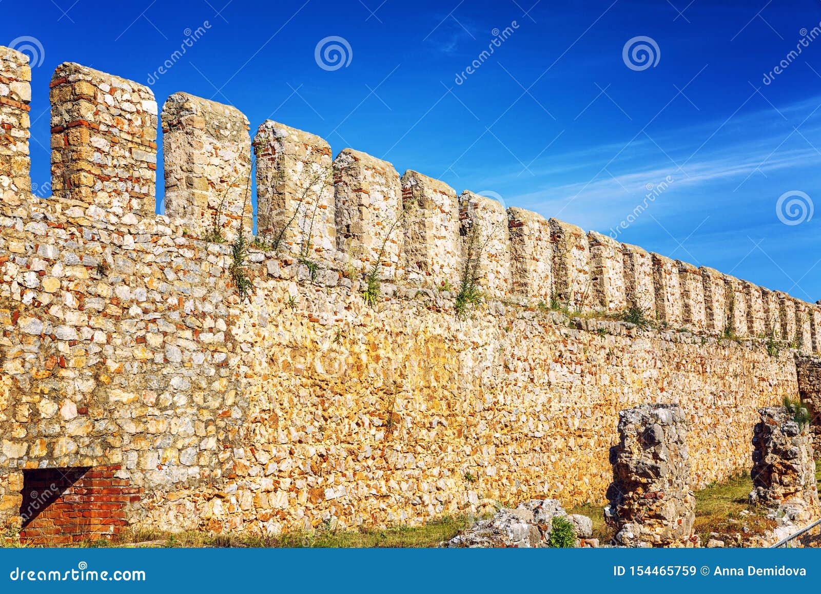Old Fortress Wall on the Background of Bright Blue Sky. Space for Text ...