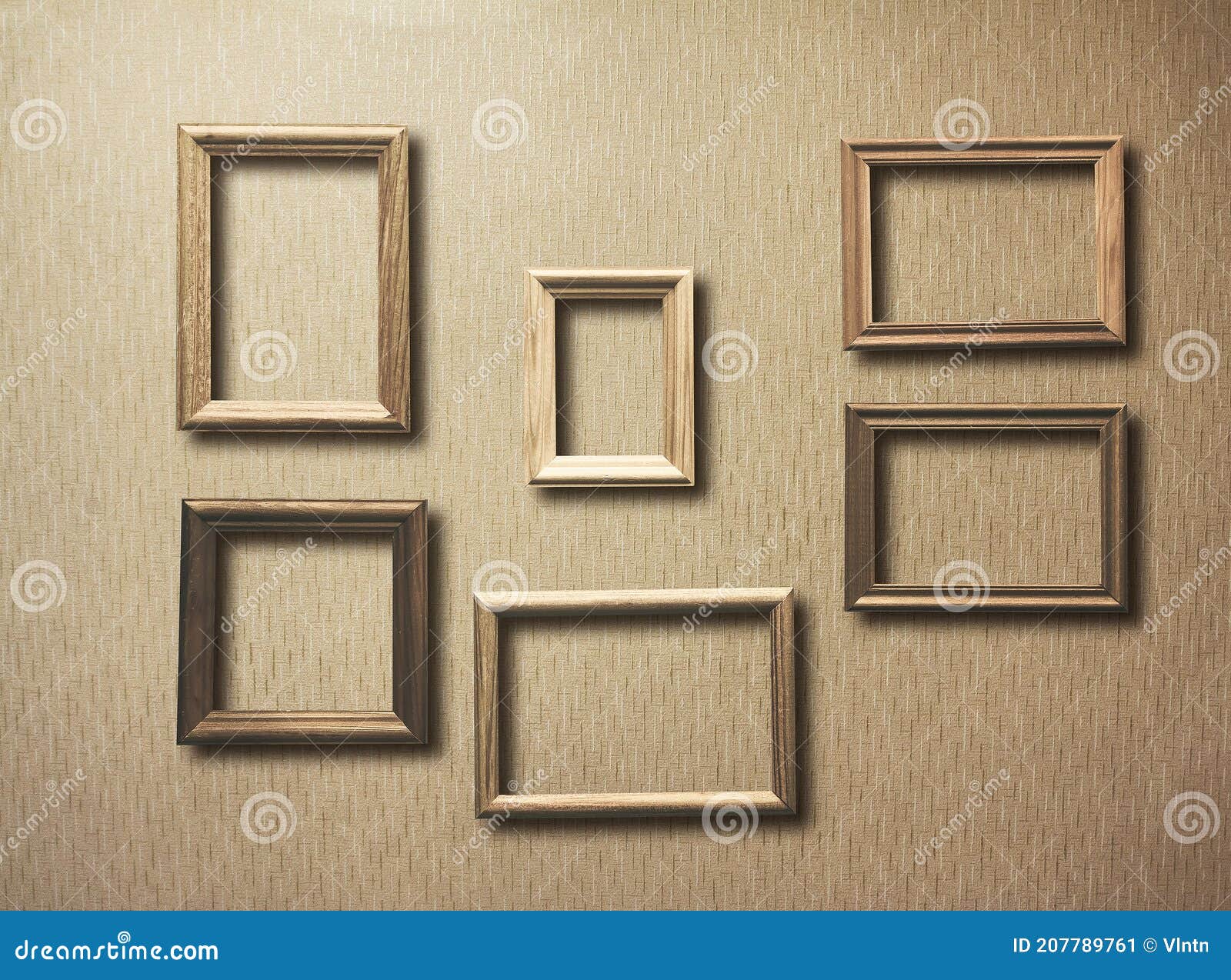 Old frames on wooden wall stock image. Image of border - 207789761