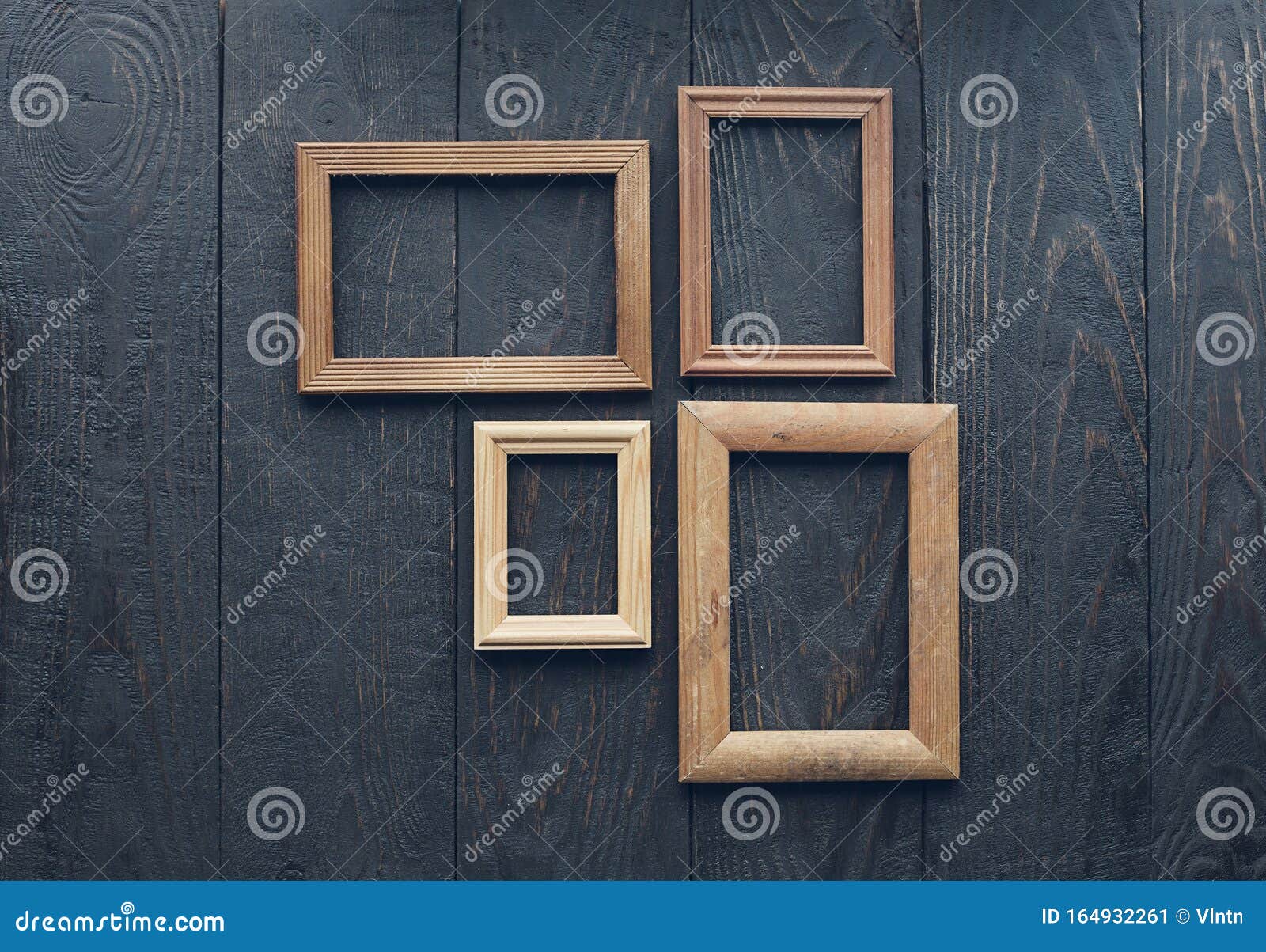 Old frames on wooden wall stock image. Image of vintage - 164932261