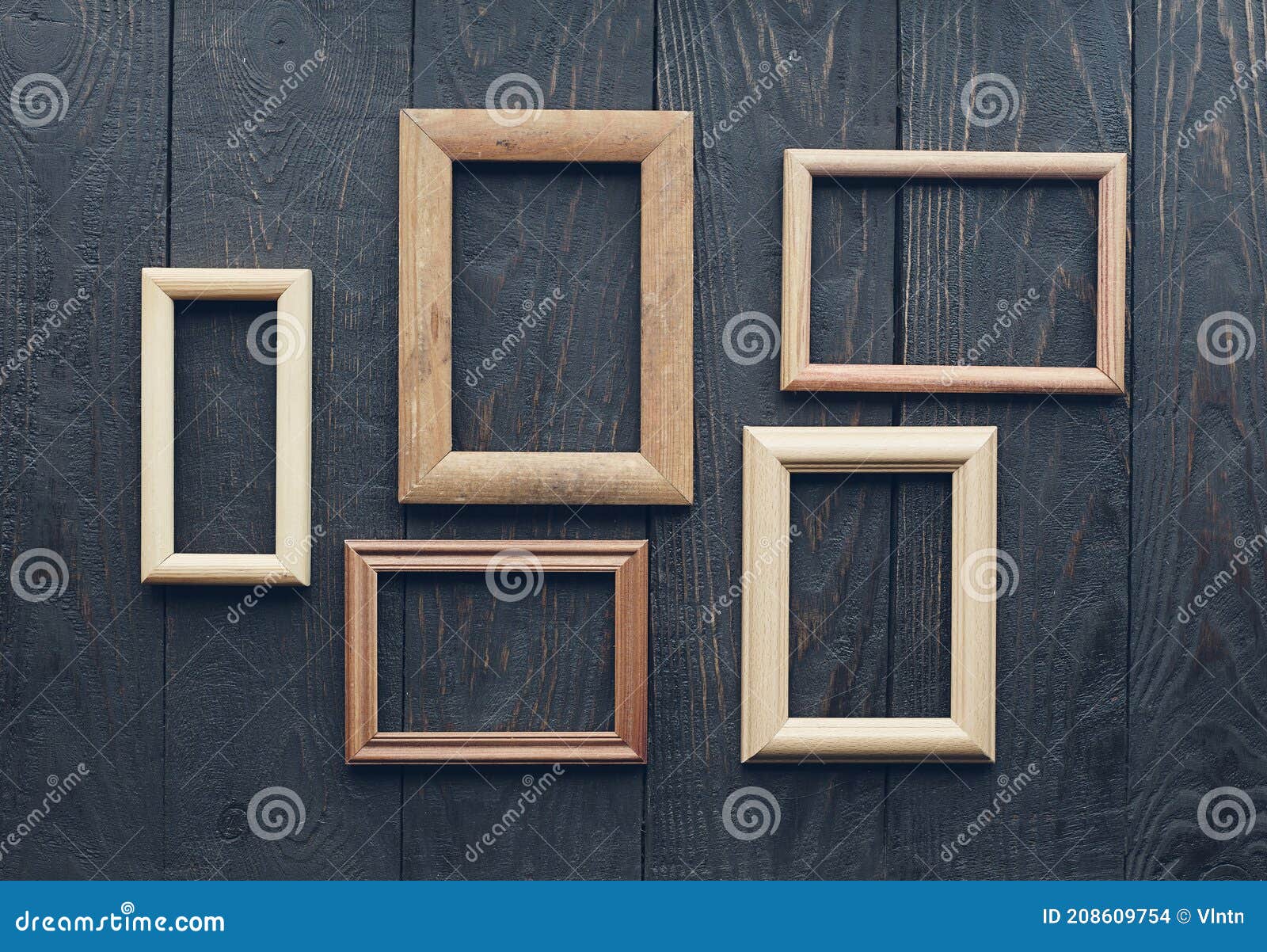 Old frames on wooden wall stock photo. Image of antique - 208609754