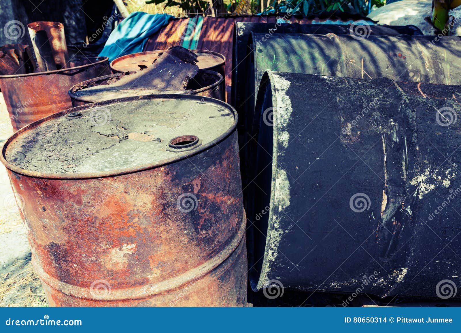Old Fuel Tanks that Lay Altogether Processed in Vintage Style Stock ...