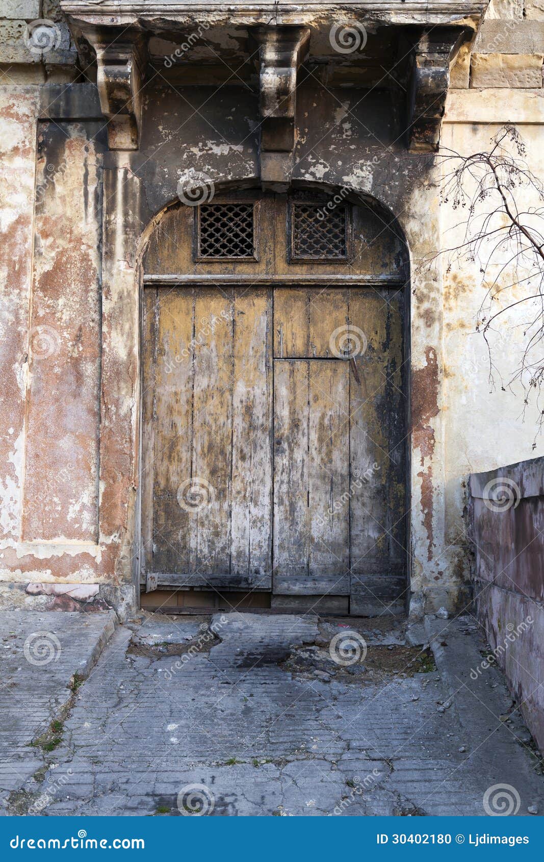 Old Garage Door with Cracked Driveway Stock Photo - Image of town ...