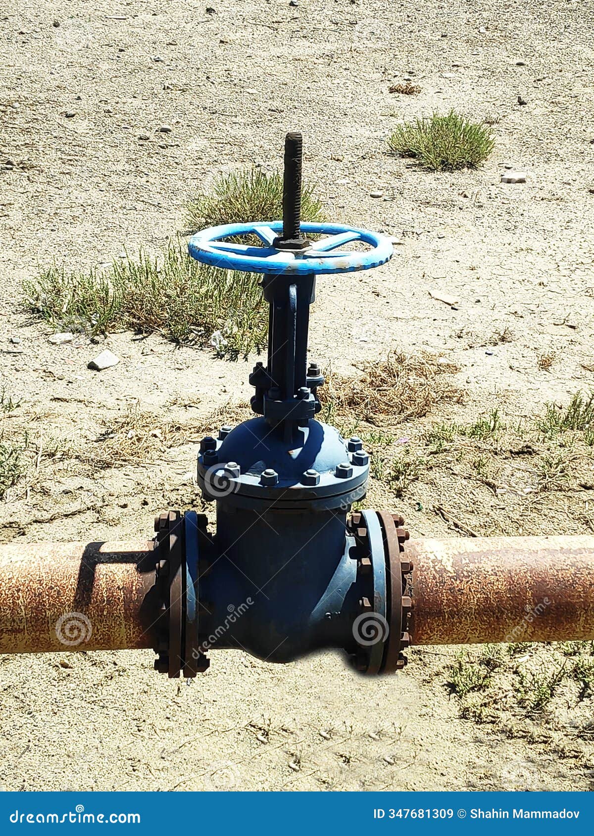 An Old Gas, Water Pipe with a Valve on the Street. Stock Image - Image ...