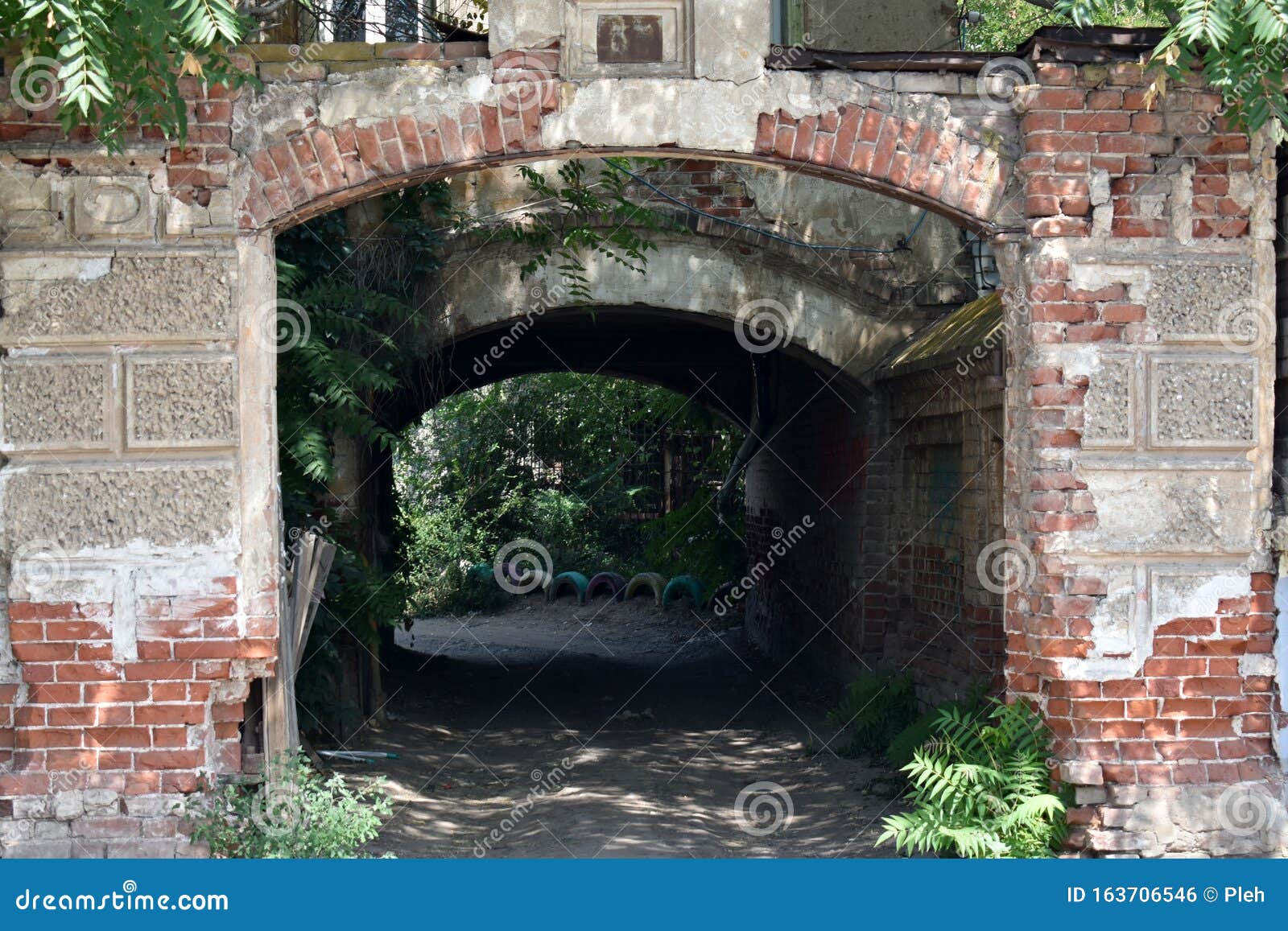 Old Gateway in the Brick Wall Stock Photo - Image of ruins, tourism ...