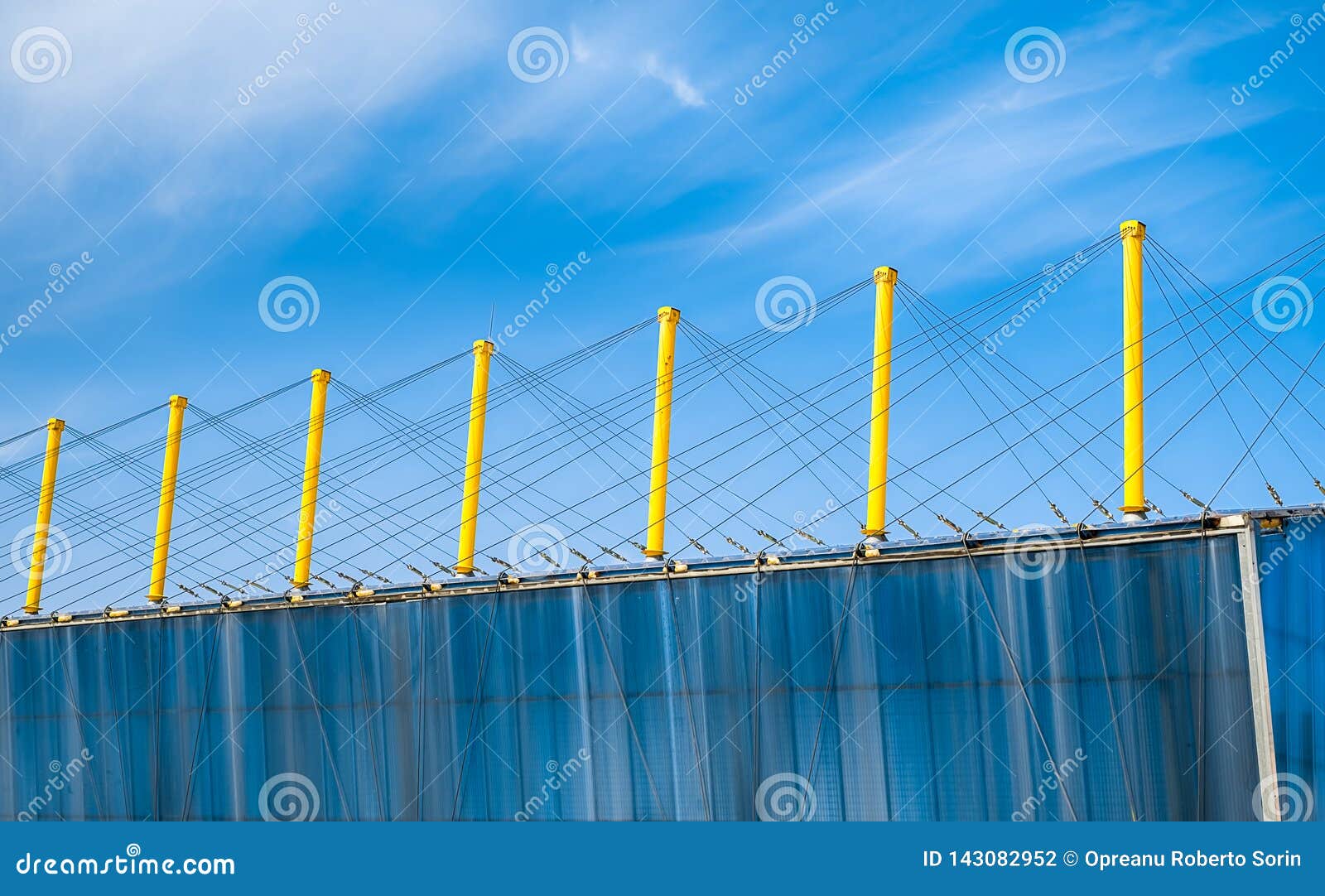 Old Glass Building with Yellow Posts Stock Photo - Image of ...
