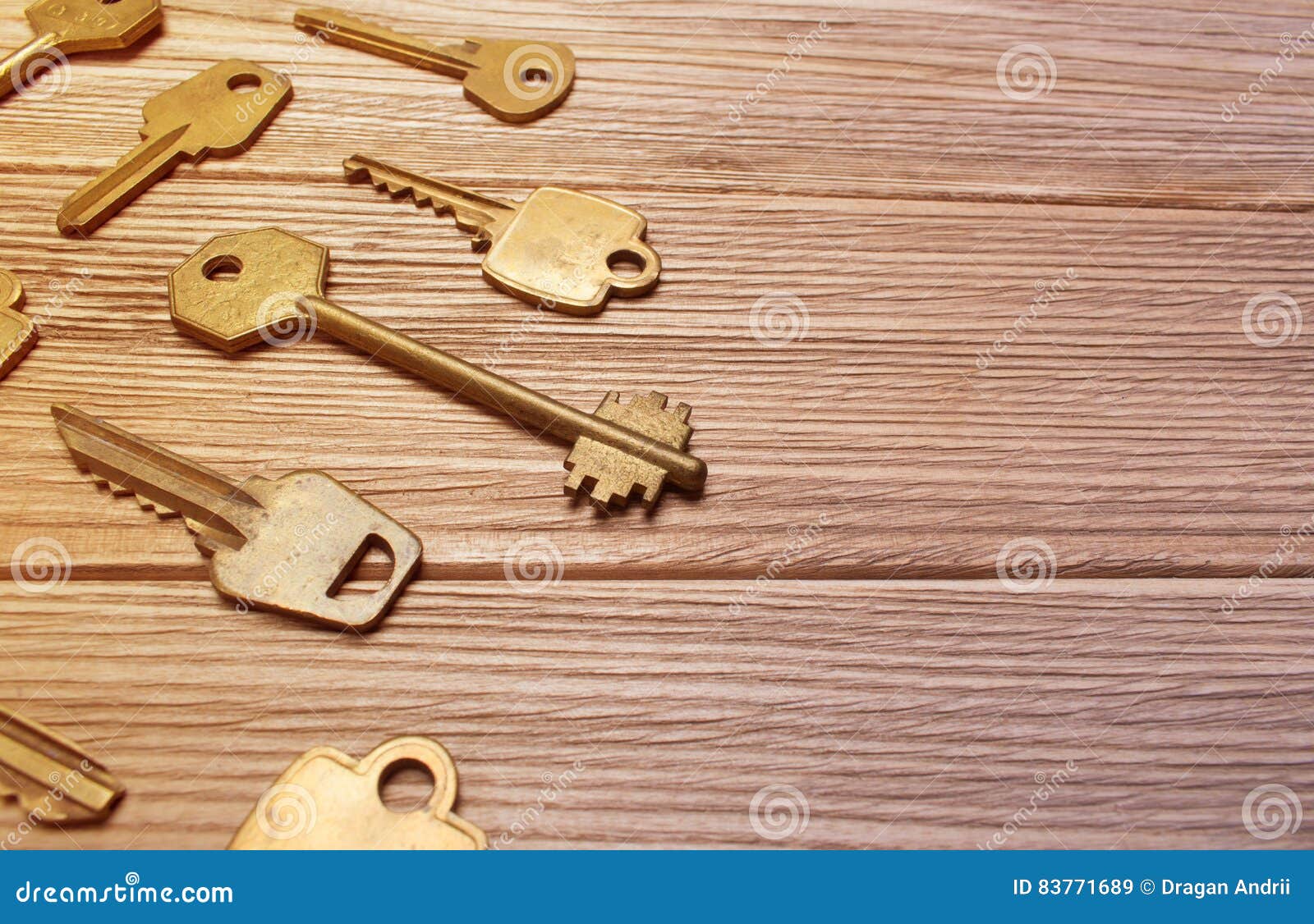Old gold keys on the table stock image. Image of home - 83771689