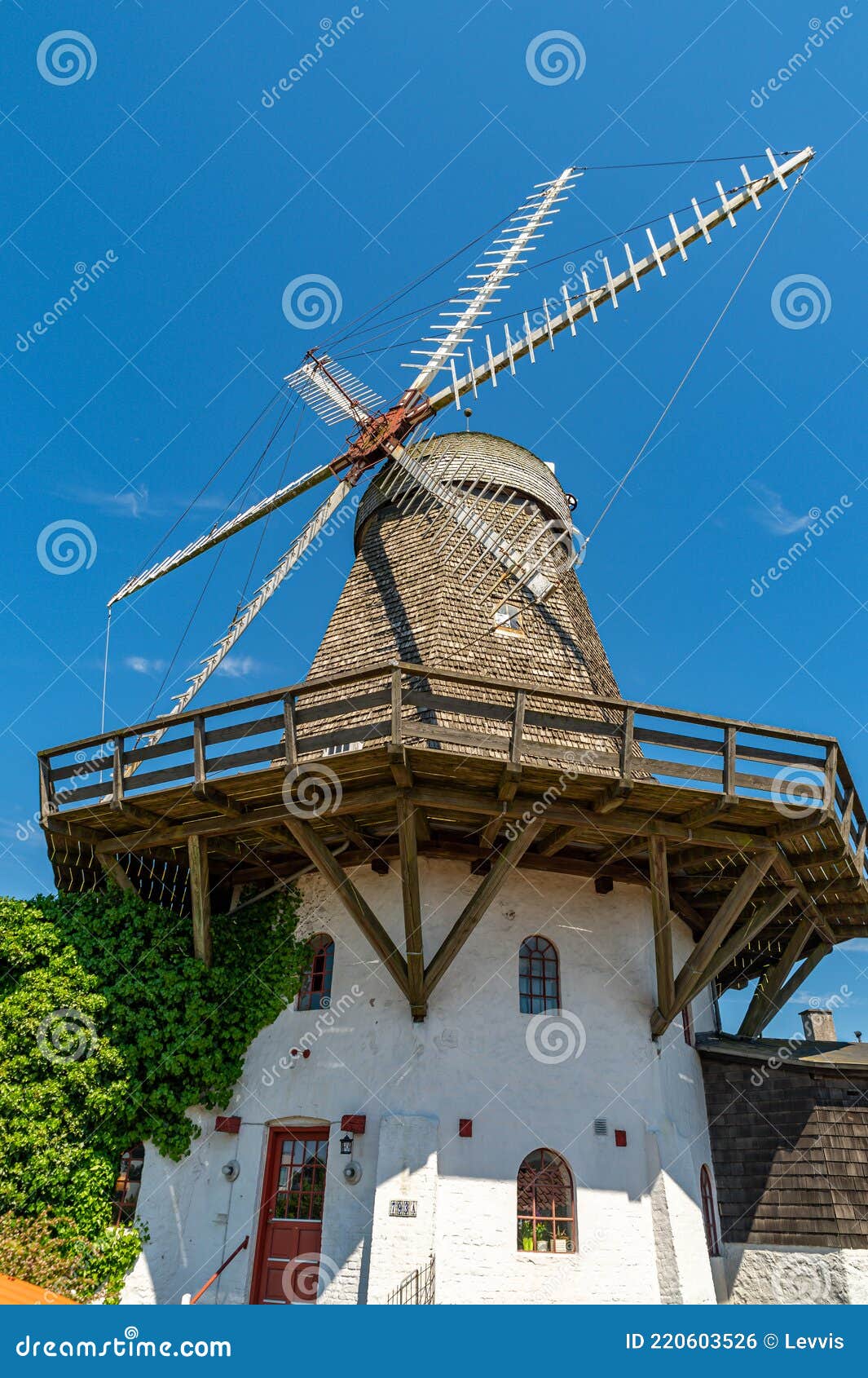 Old grain mill in Denmark stock photo. Image of historic - 220603526