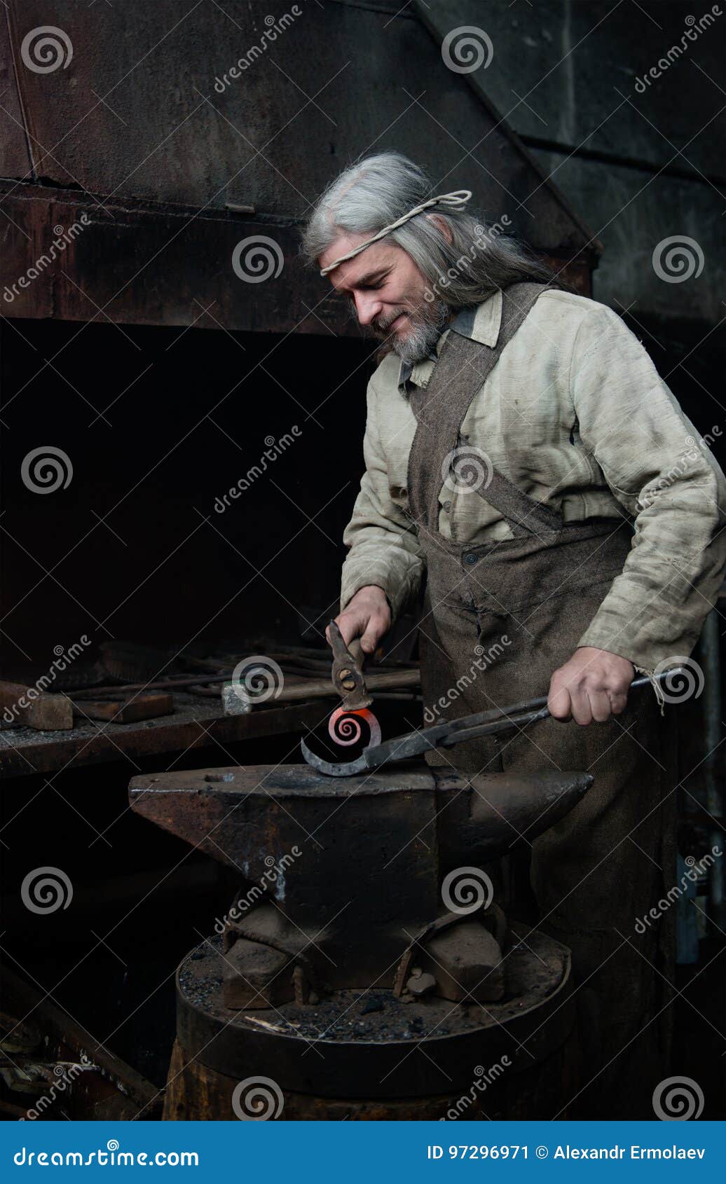 Blacksmith Forges Horseshoe With Hammer On Anvil. Ancient Craft ...
