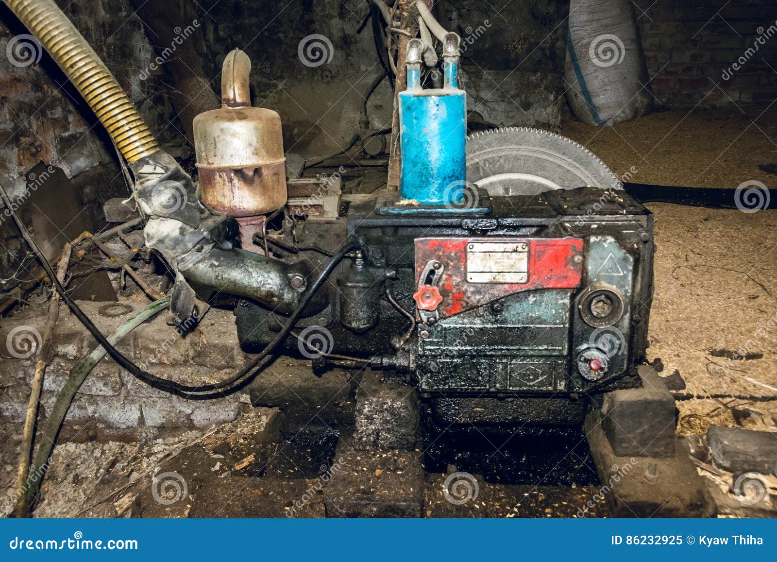 Old and Greasy Engine Pump Functioning in Burmese Village Stock Image ...