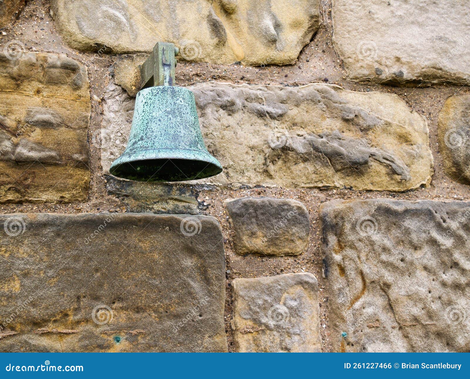 Old Green Bell on Stone Wall Stock Photo - Image of abstract, oxide ...