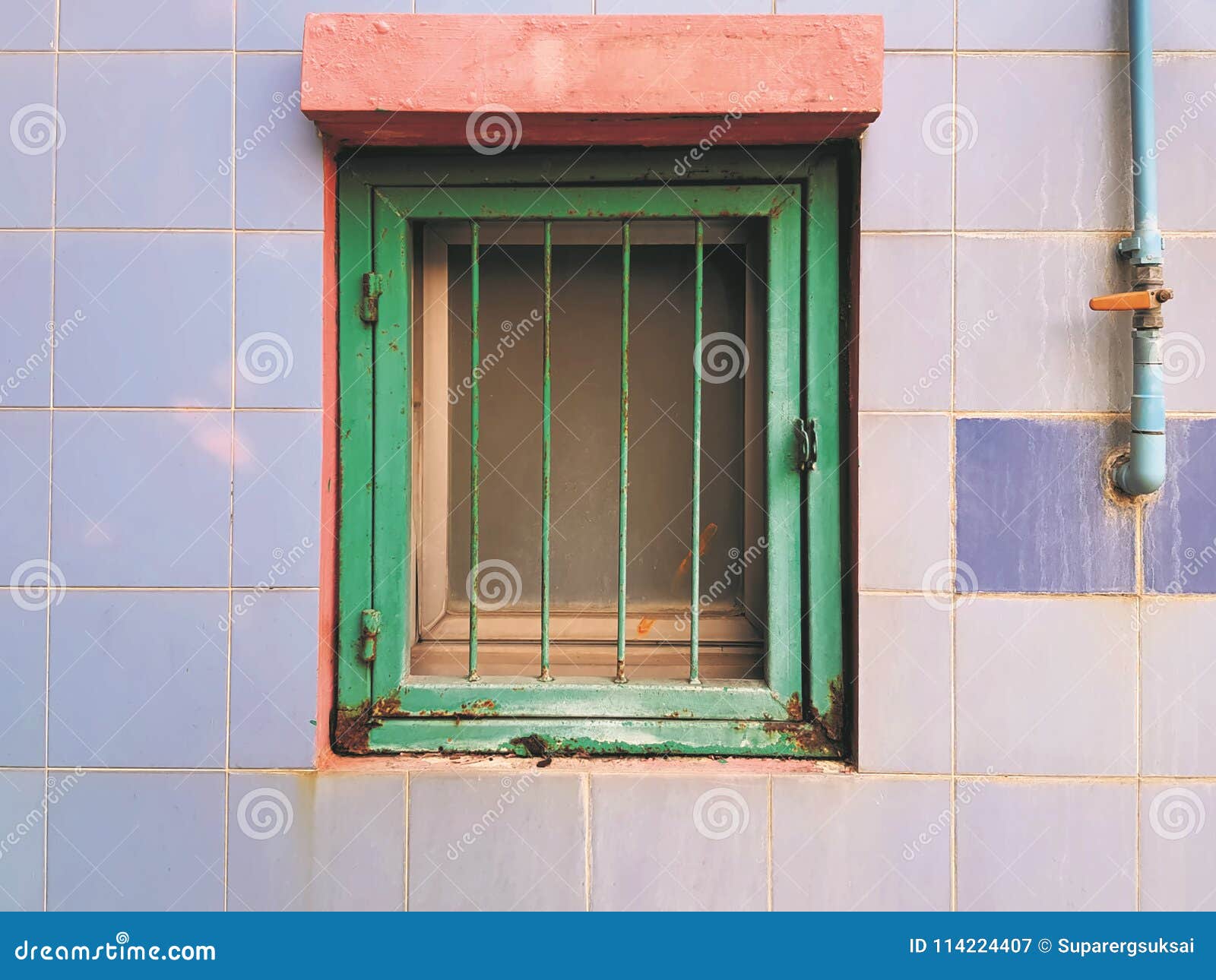 Old Green Rusty Window on Blue Tiled Wall Stock Image - Image of window ...