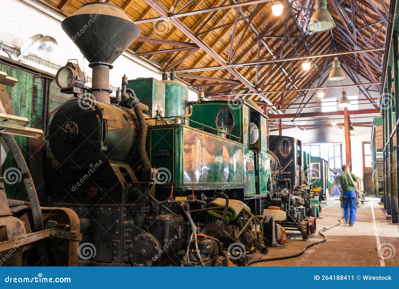 Old Green Train Under Renovation in an Industrial Site Editorial Photo ...