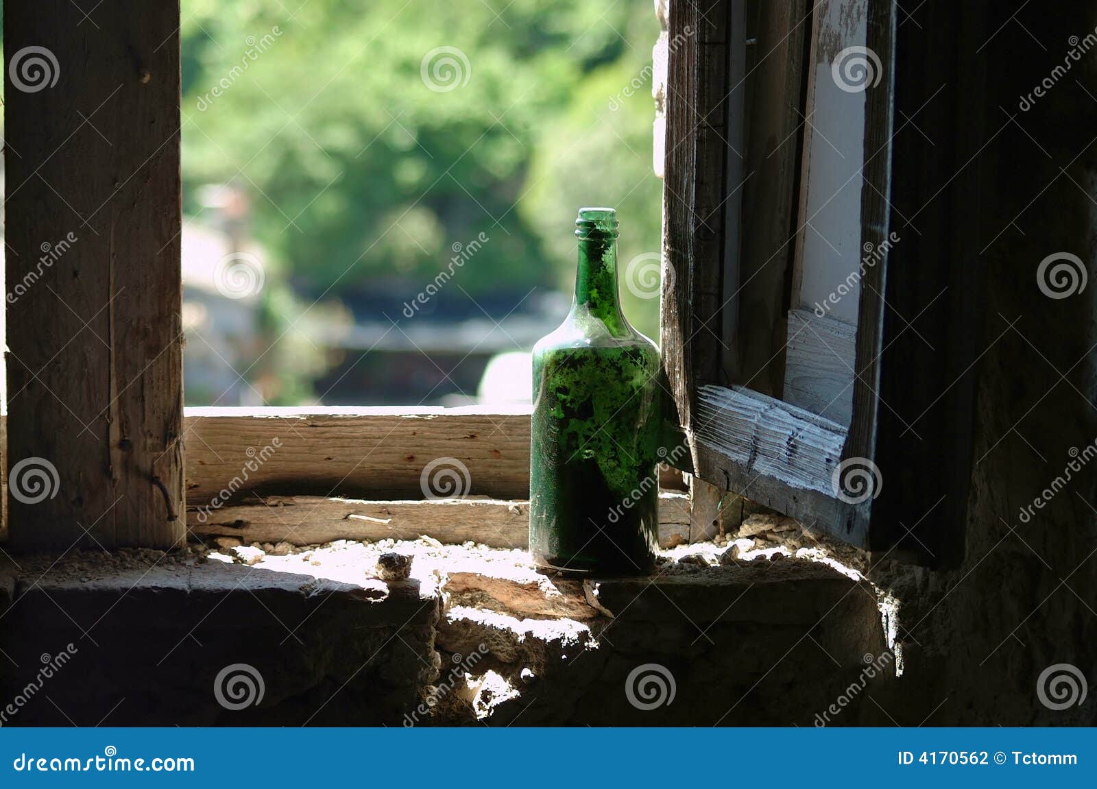 Old Green Wine Bottle in Window Stock Photo - Image of mystical ...