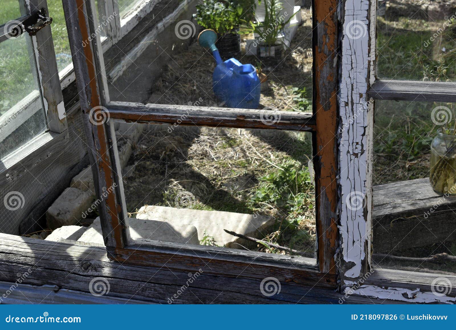 An Old Greenhouse of Rotten Windows with Cracked Paint Stock Photo ...