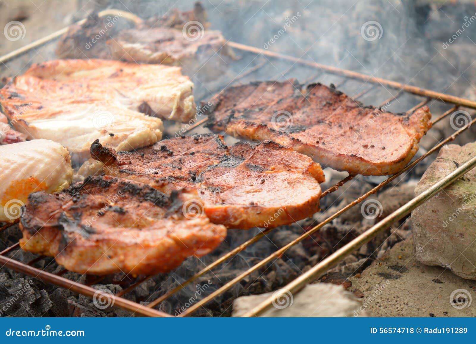 Old grill on rocks stock photo. Image of rocks, meat - 56574718