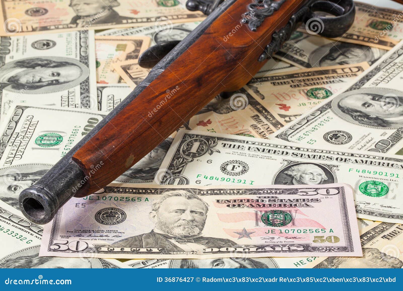 Old gun and money stock image. Image of british, economy - 36876427