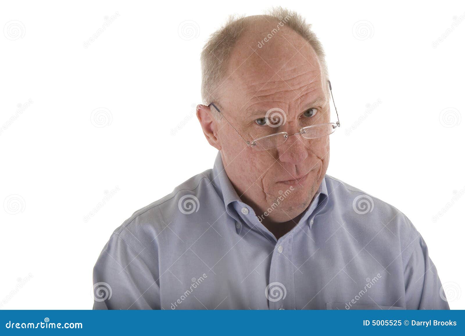 Old Guy in Blue Shirt Looking Skeptical Stock Image - Image of ...