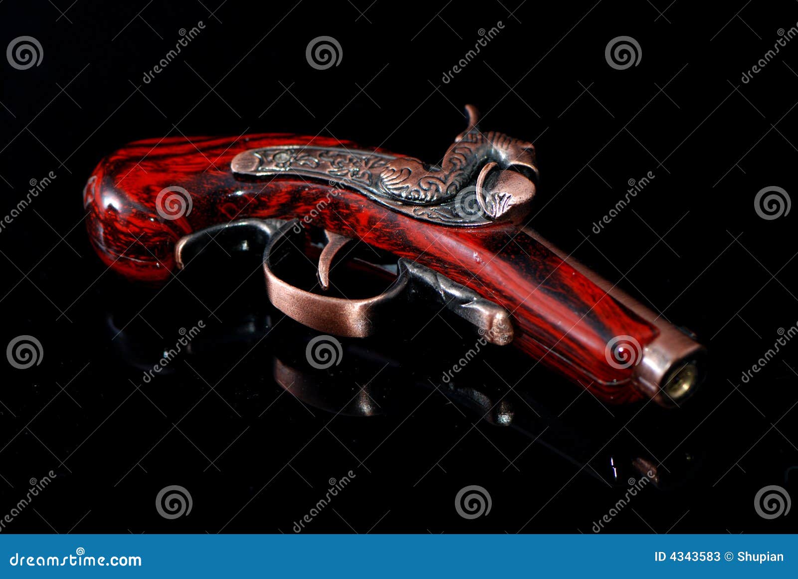 An old hand gun stock image. Image of container, sculptured - 4343583