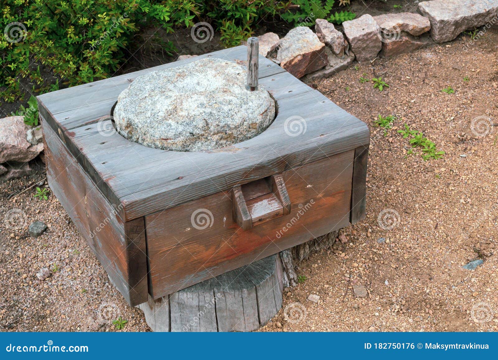 Old hand mill for grain stock photo. Image of heavy - 182750176