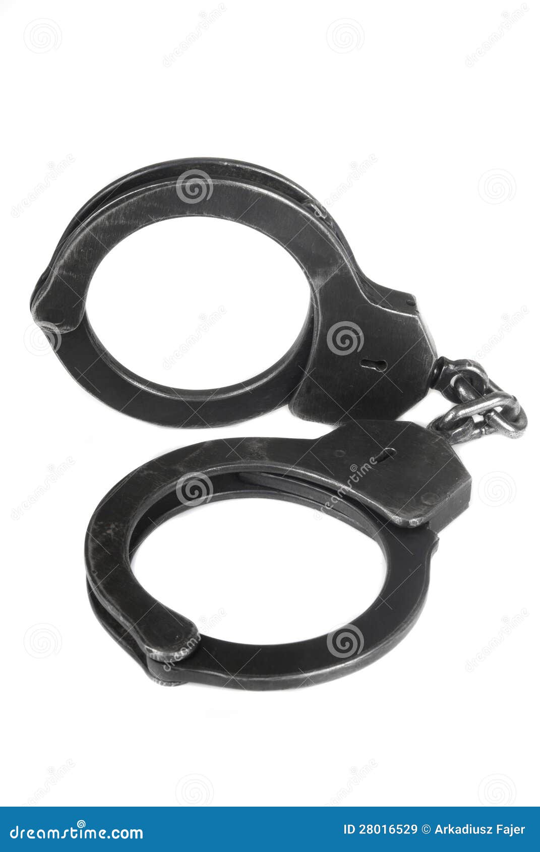 A Black Handcuff With A Brown Pistol Magazine In It With A Black 9mm ...